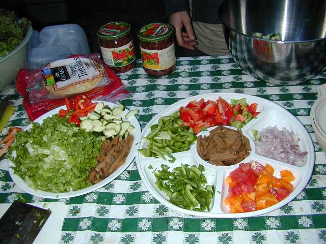 The fixings for taco / burrito bar